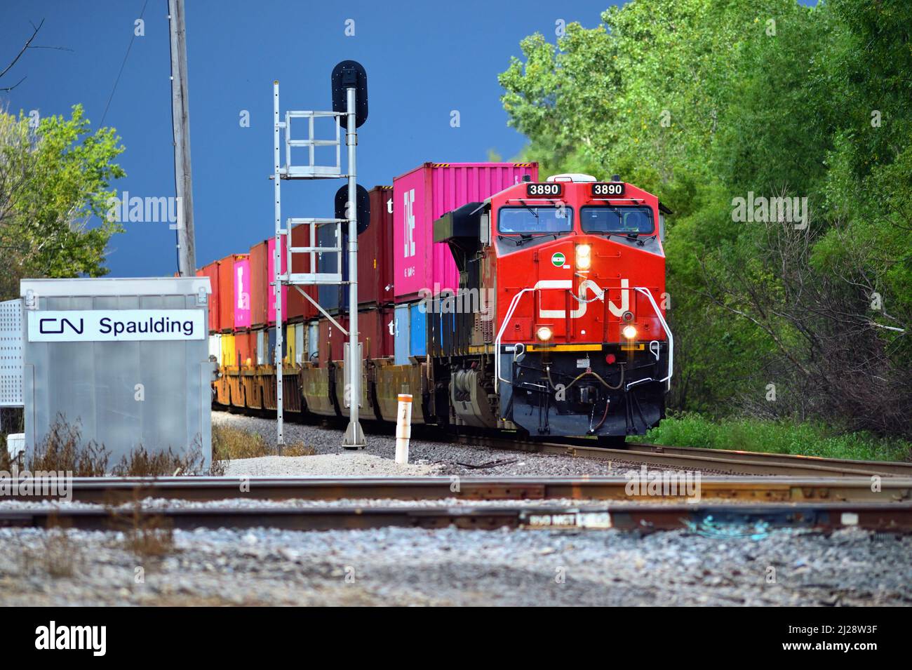 Bartlett, Illinois, USA. Sun shining on a Canadian National Railway ...