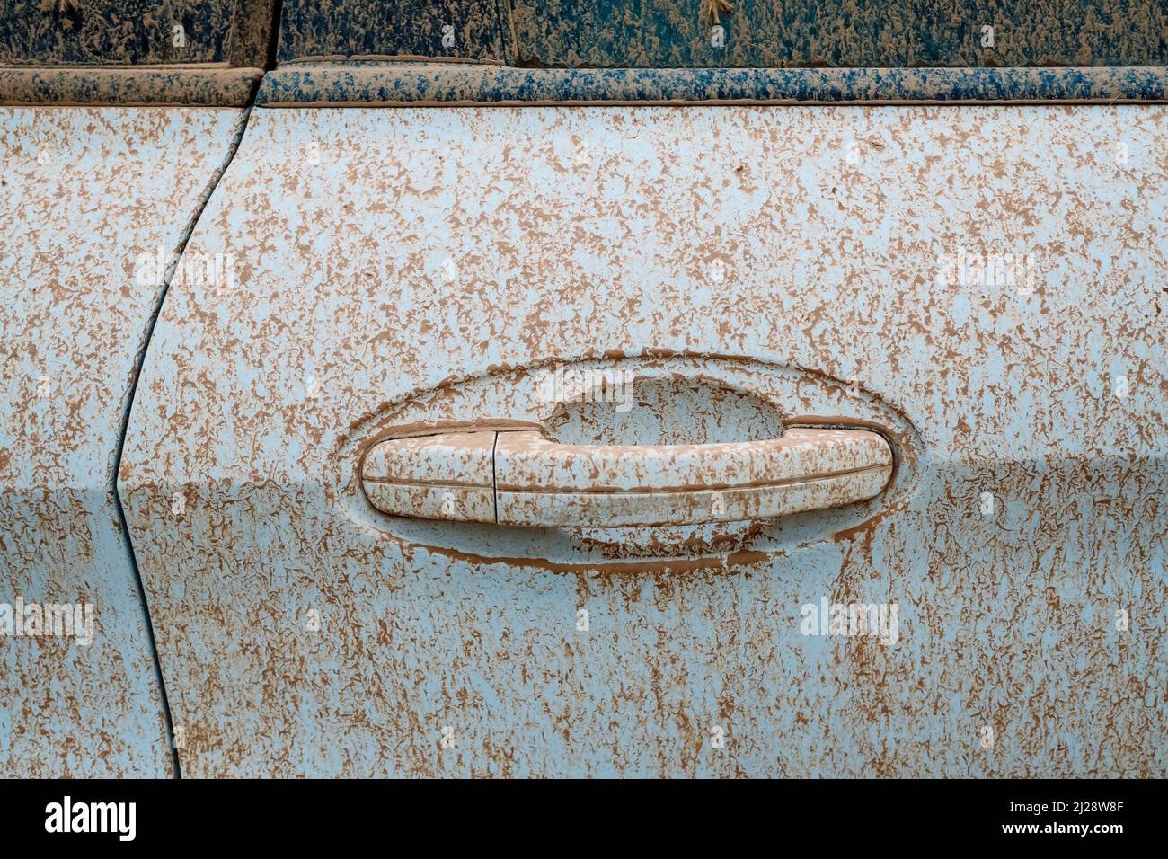 Detail of white cars very dirty from rains of mud, unwashed and ...