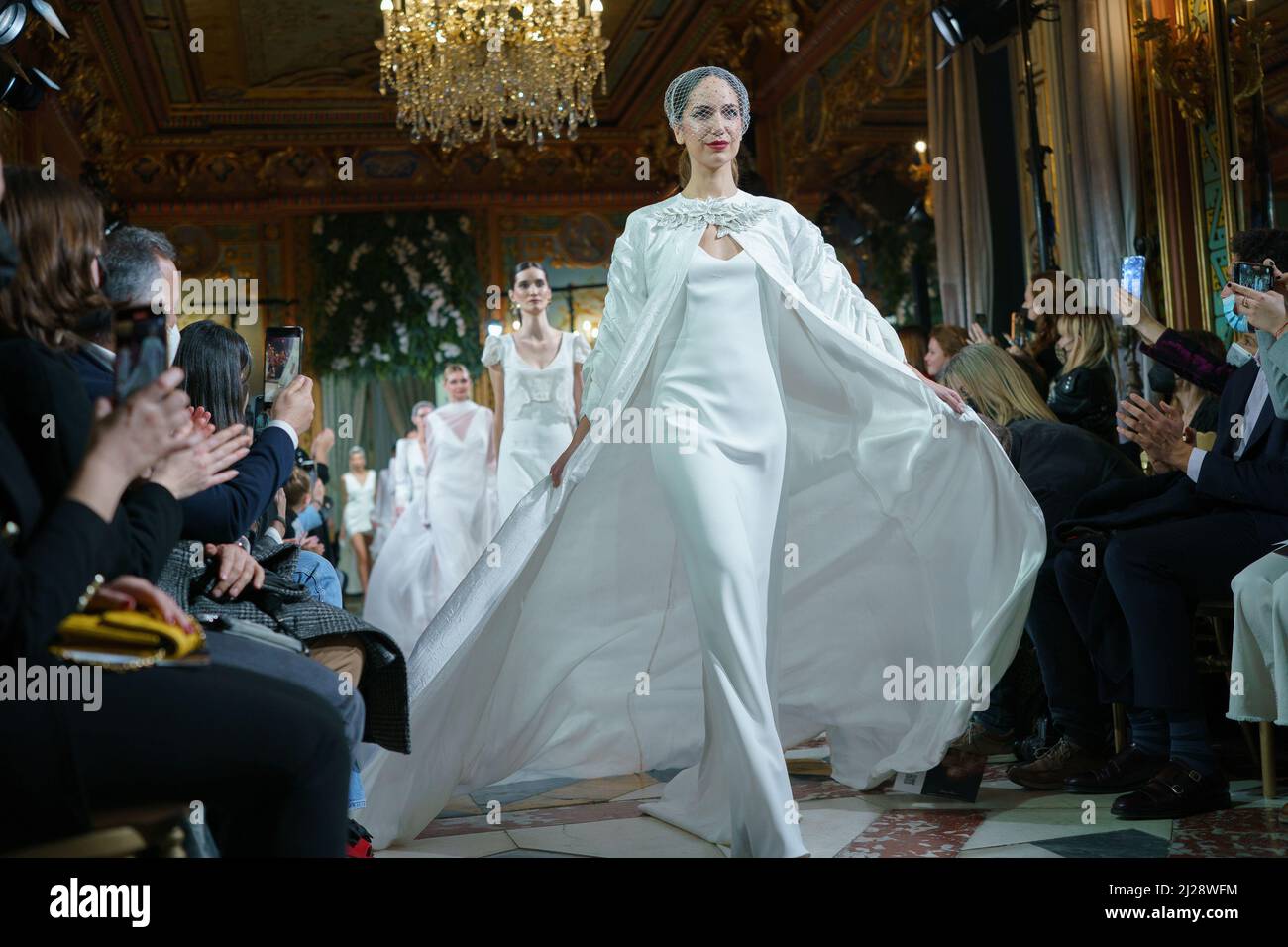 Models showcase Lorena Merino design during the Atelier Couture bridal ...