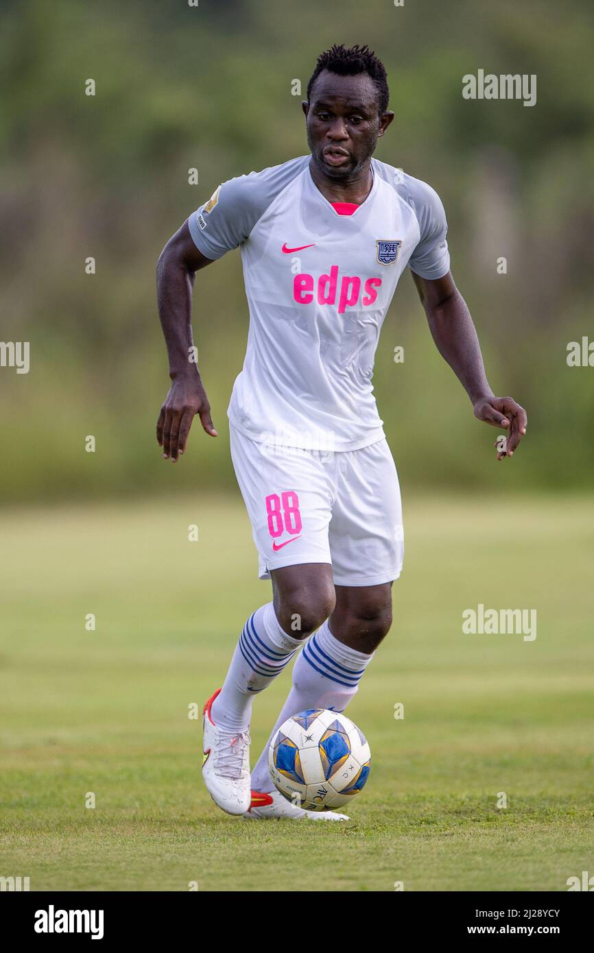 SRIRACHA CITY, THAILAND - MARCH 30: Alex Akande of Kitchee SC during ...