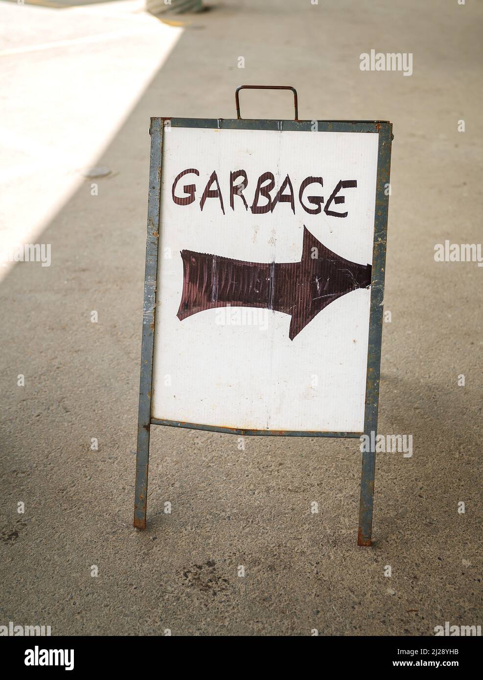 Hand lettered garbage sign at a waste transfer station at a local ...