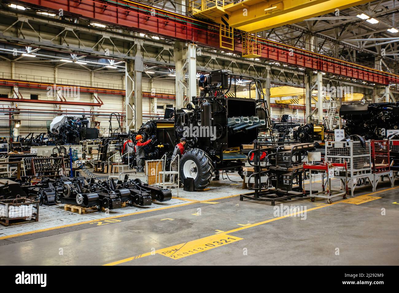 The process of assembling agricultural tractors and harvesters on the ...