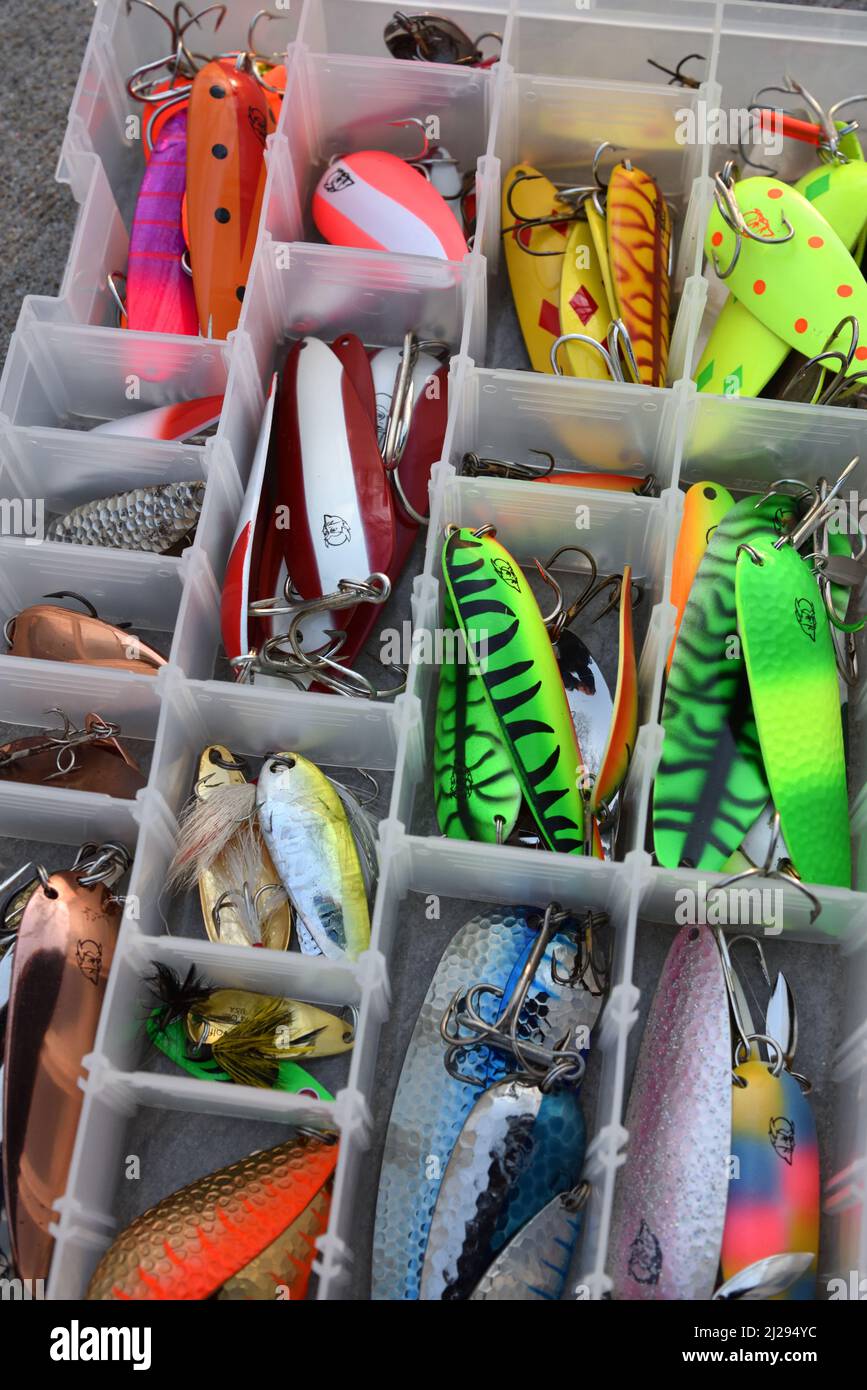 Fishing tackle lures and tackle box Stock Photo - Alamy