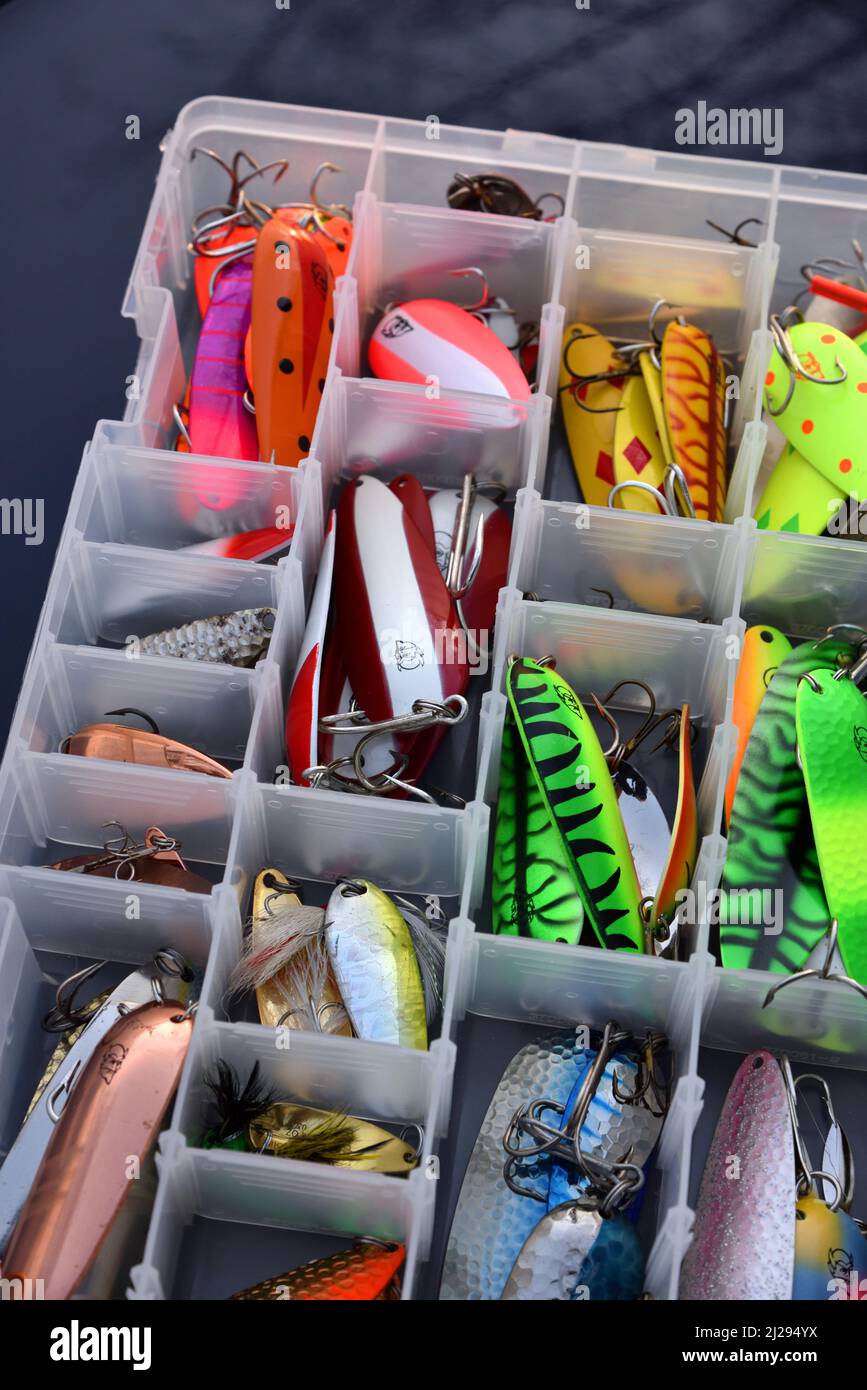 Fishing tackle lures and tackle box Stock Photo - Alamy