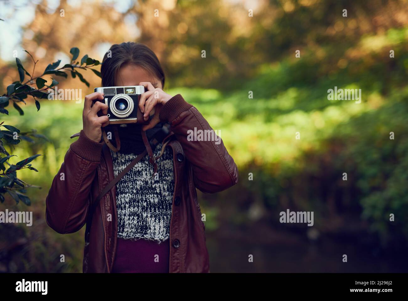 Its like seeing the world through new eyes. Shot of a young girl taking ...