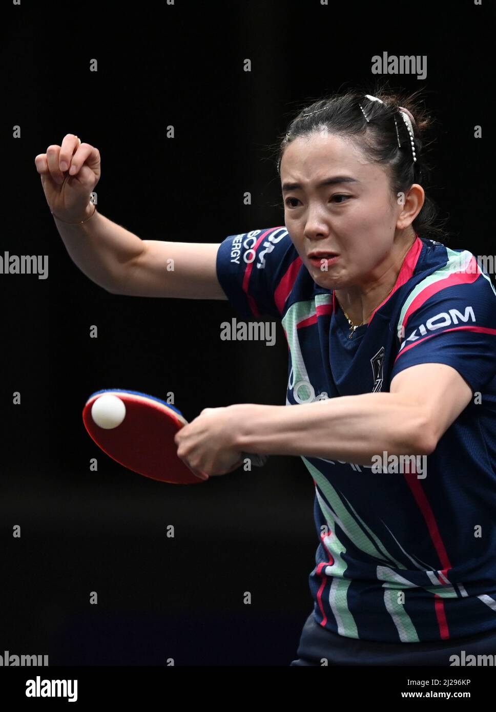 Doha, Qatar. 30th Mar, 2022. Jeon Jihee of South Korea hits a return ...