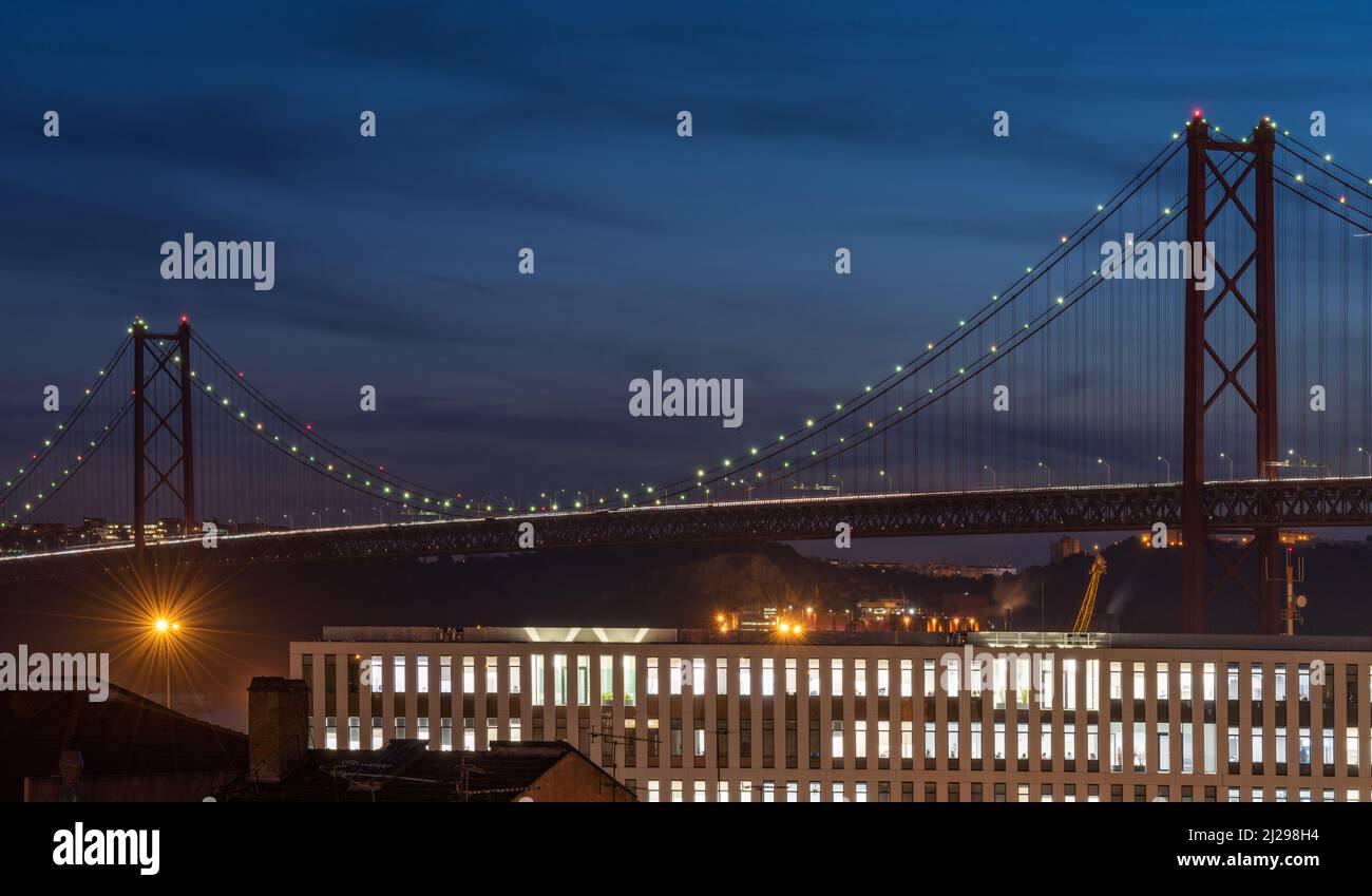 The beautiful nightscape in Lisbon, next to the 25 de Abril bridge ...