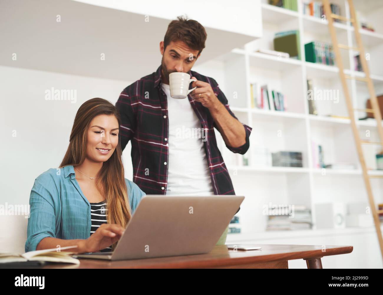 Hes always ready to offer assistance. Shot of a happy young man ...