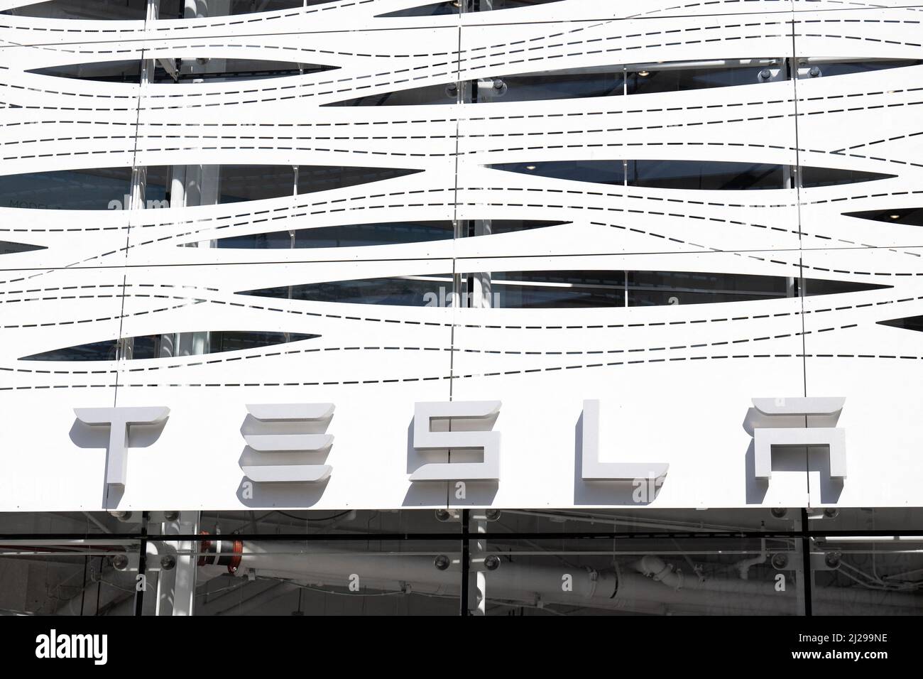 A shop sign of TESLA, on March 28 2022 in Los Angeles CA, USA. Photo by ...