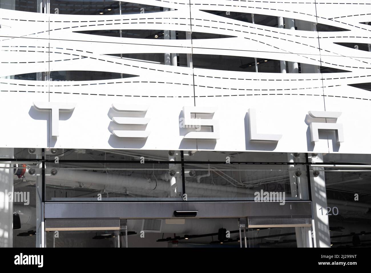 A shop sign of TESLA, on March 28 2022 in Los Angeles CA, USA. Photo by ...