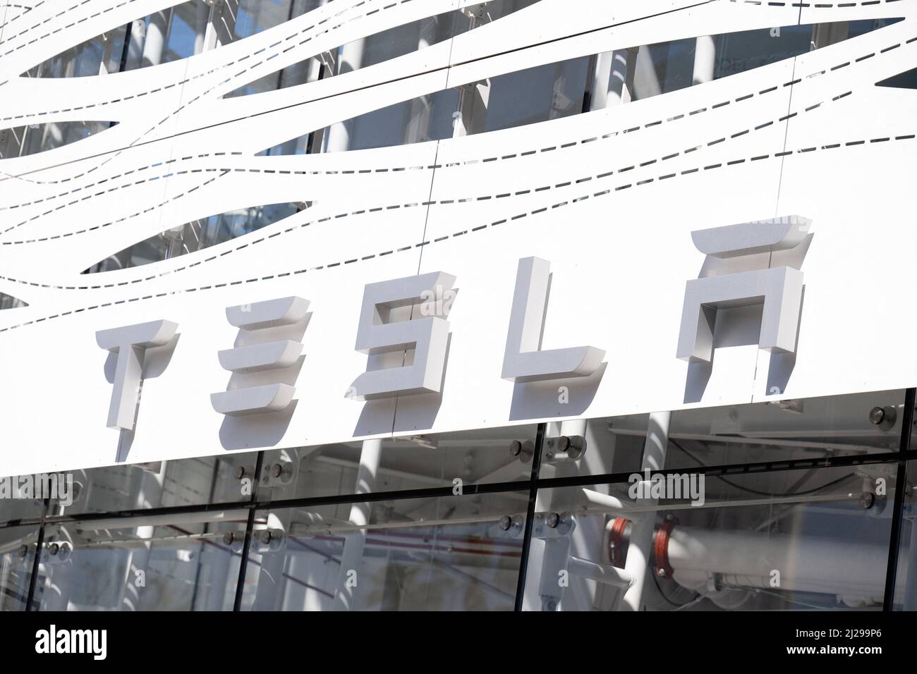 A shop sign of TESLA, on March 28 2022 in Los Angeles CA, USA. Photo by ...