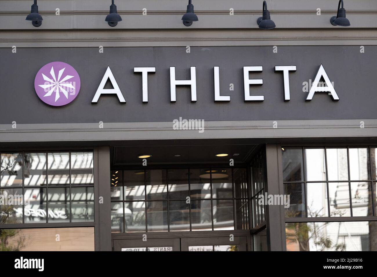 A shop sign of ATHLETA, on March 28 2022 in Los Angeles CA, USA. Photo ...