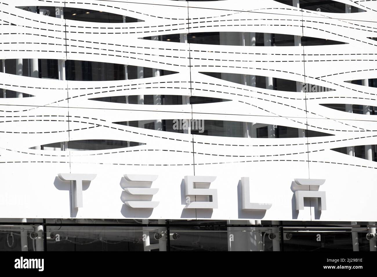 A shop sign of TESLA, on March 28 2022 in Los Angeles CA, USA. Photo by ...