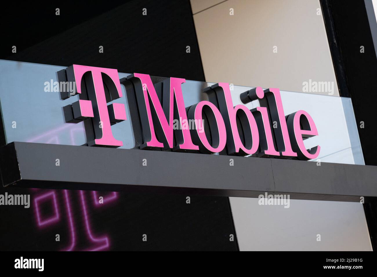 A shop sign of T Mobile, on March 28 2022 in Los Angeles CA, USA. Photo ...