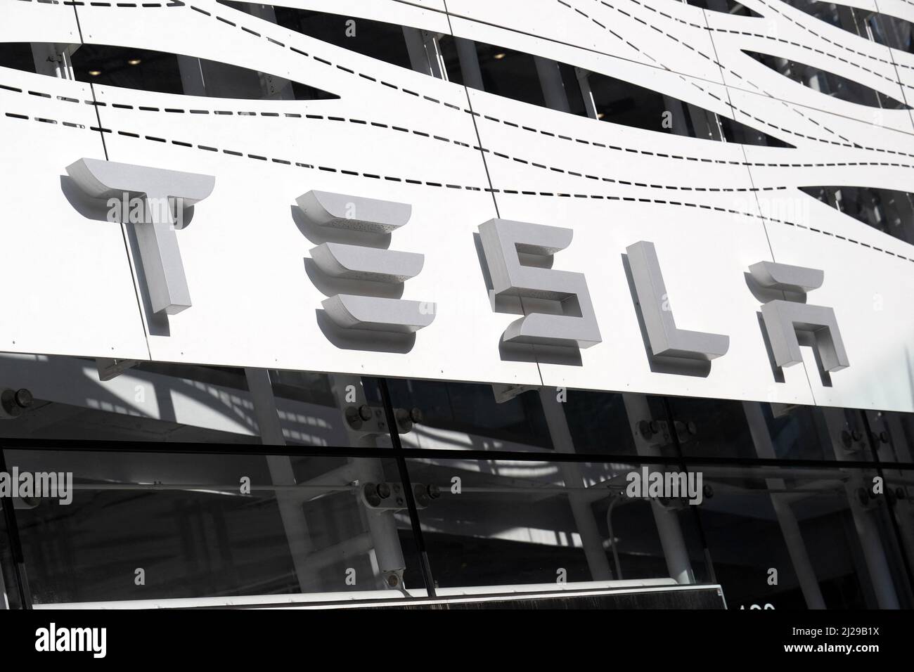 A shop sign of TESLA, on March 28 2022 in Los Angeles CA, USA. Photo by ...