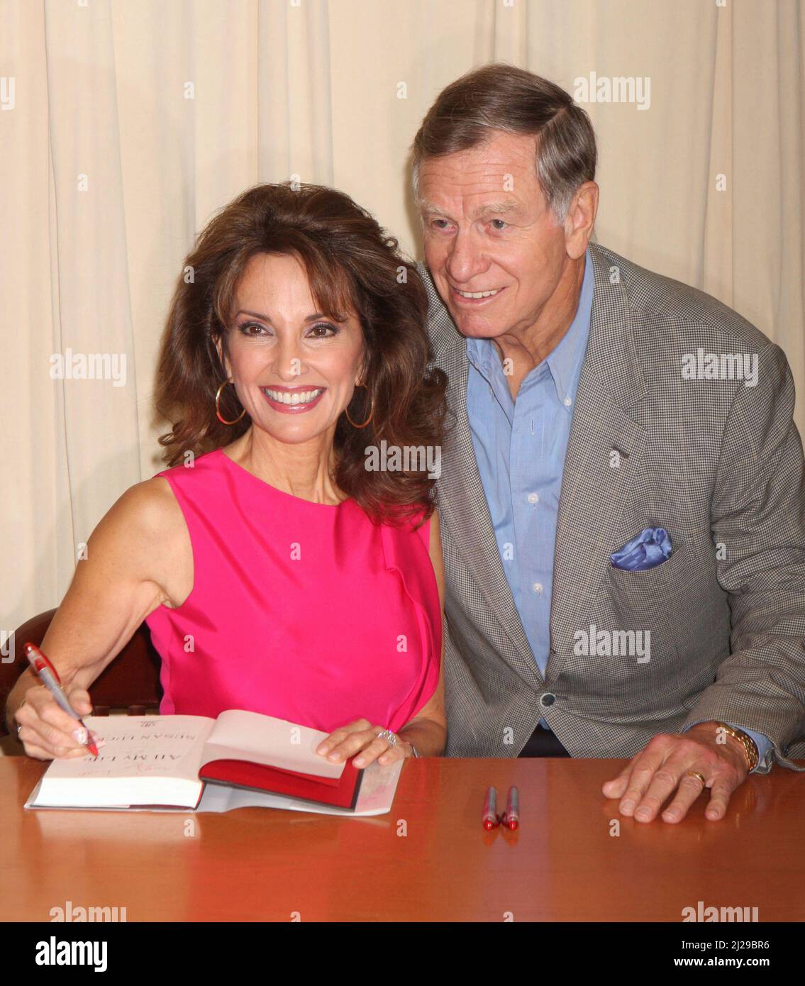 Susan Lucci with husband Helmut Huber signing her book, "All My Life: A ...