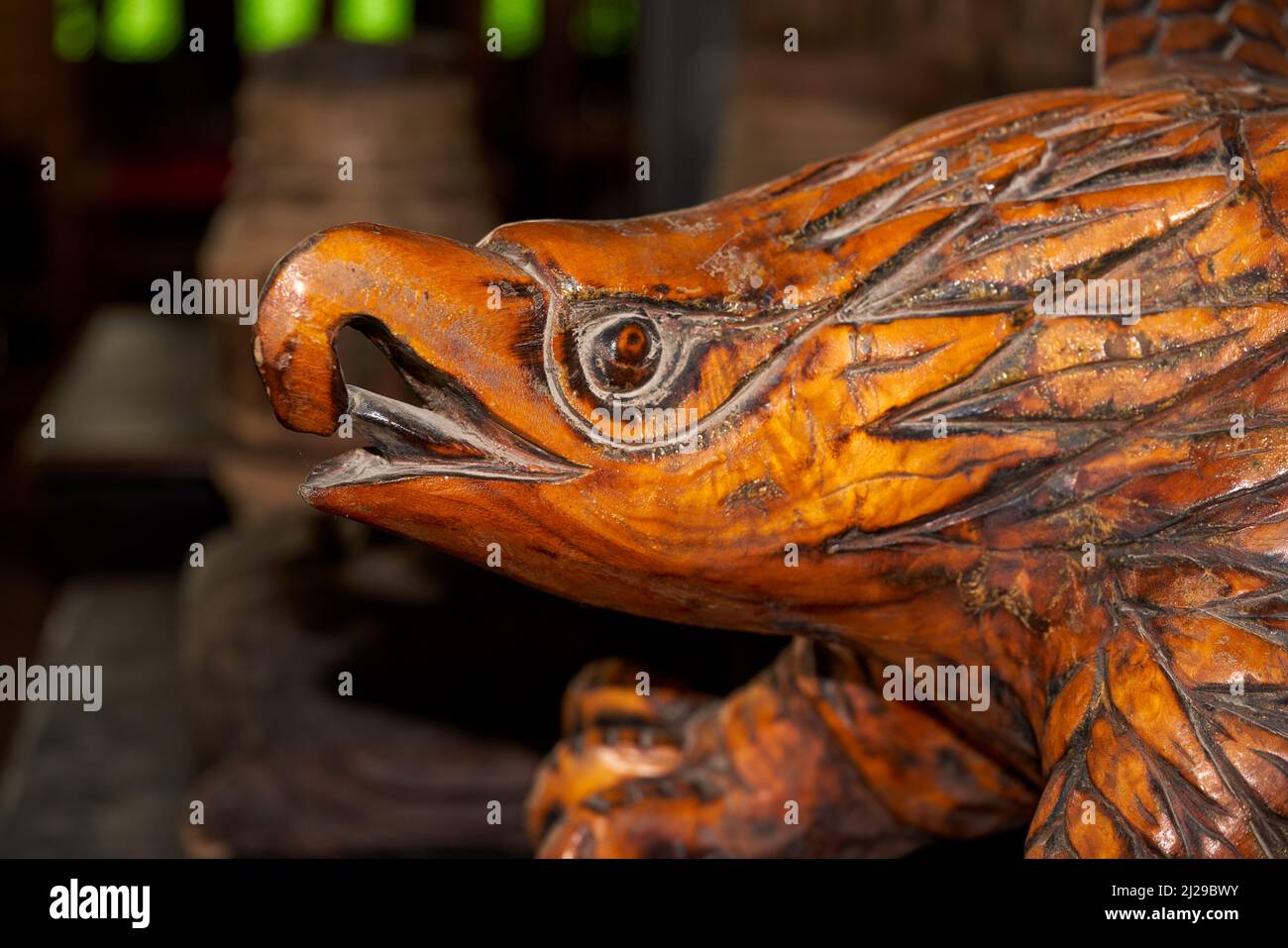 Close-up of a wood-carved eagle head Stock Photo - Alamy