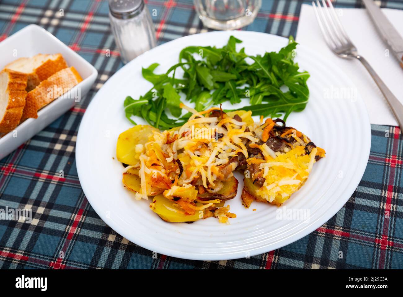 Russian french-style meat on a plate Stock Photo - Alamy