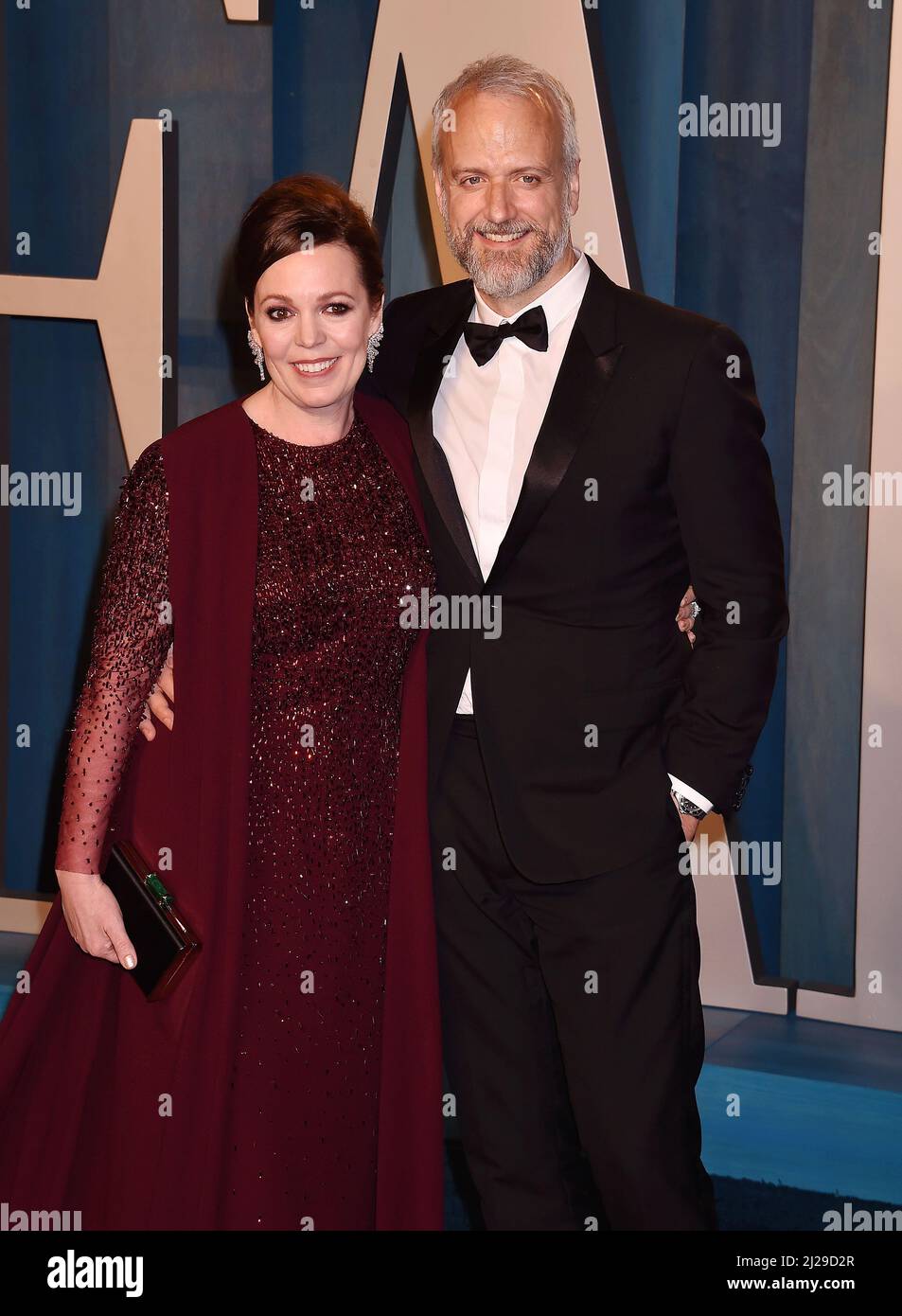 BEVERLY HILLS, CA - MARCH 28: (L-R) Olivia Colman and Ed Sinclair ...