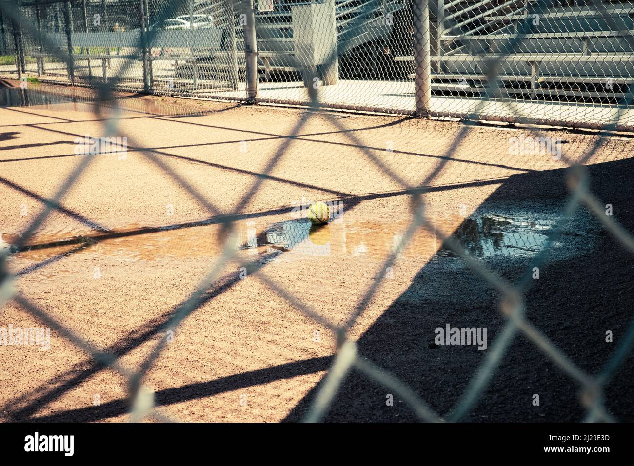 Wet baseball field after a rain storm Stock Photo - Alamy