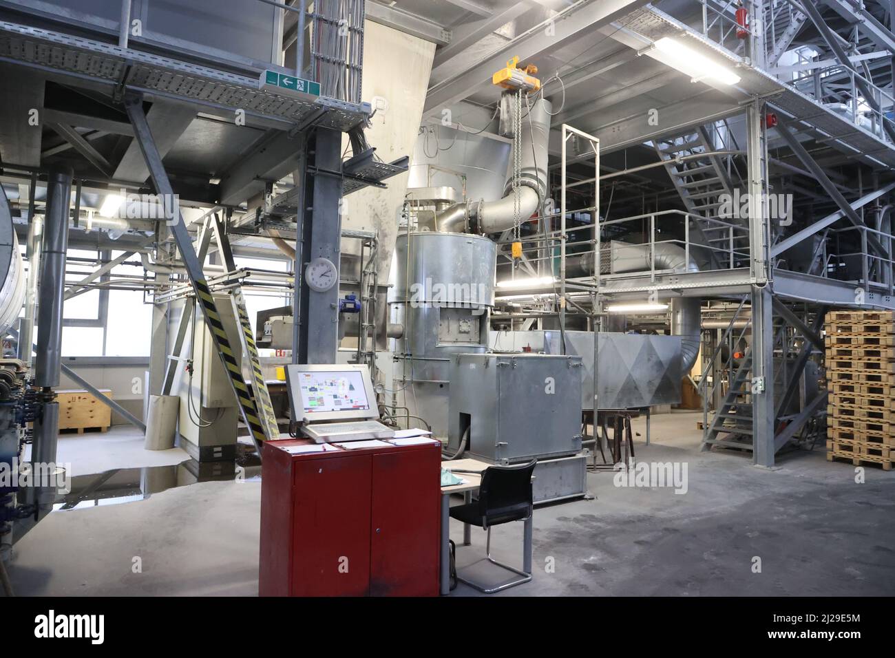 Gera, Germany. 30th Mar, 2022. Containers for the production of silica ...