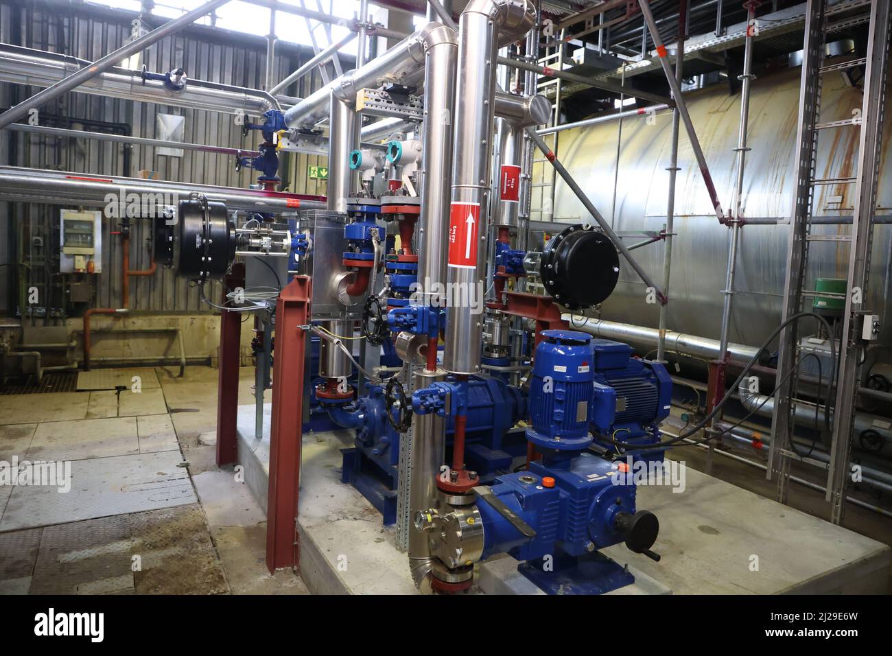 Gera, Germany. 30th Mar, 2022. Pumps stand in a production hall on the ...