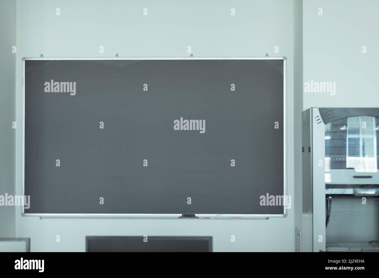 Classical whiteboard in a university classroom or a meeting room in a ...