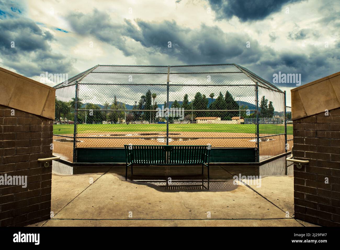 Wet baseball field after a rain storm Stock Photo - Alamy