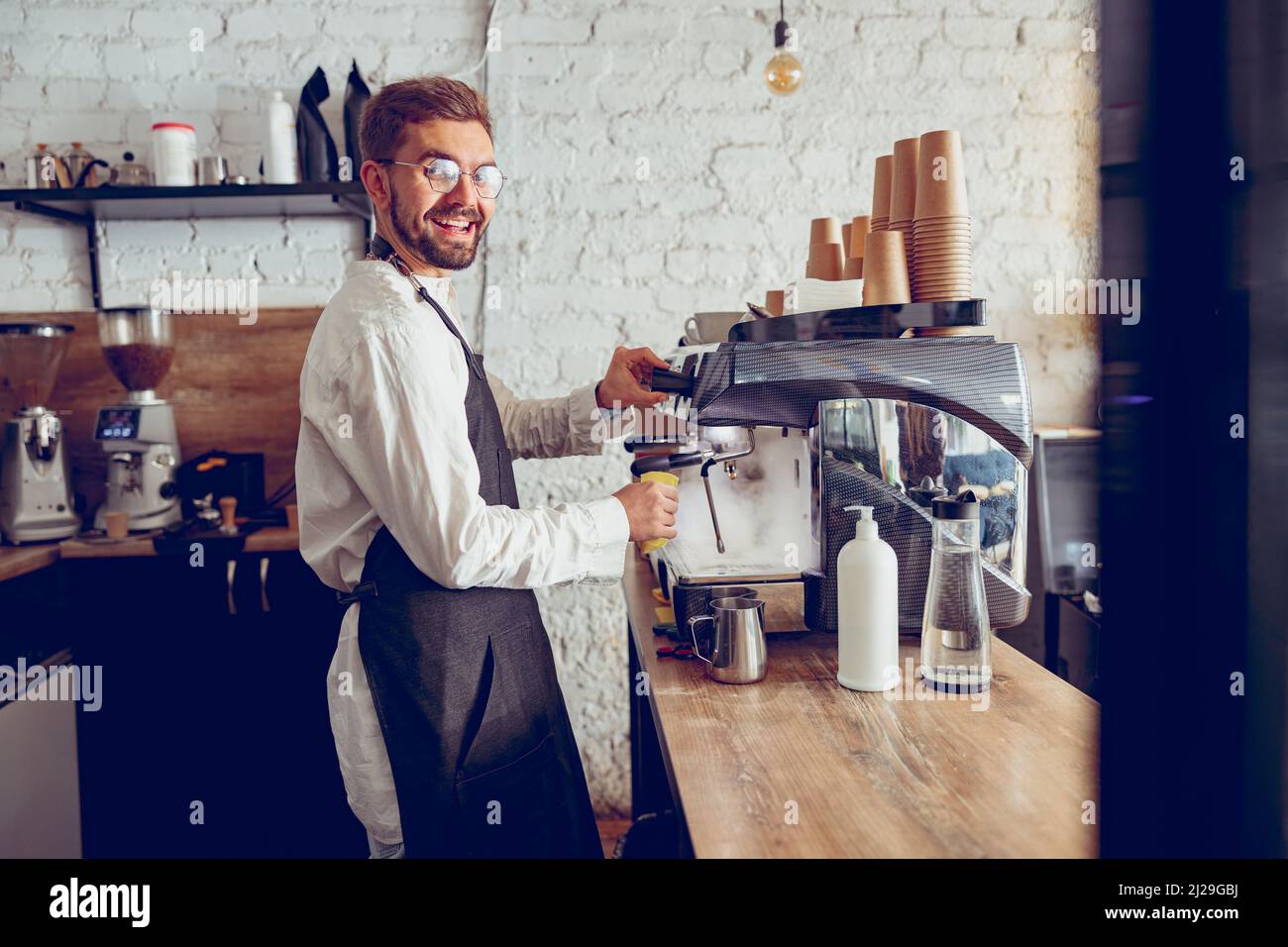 Using coffee machine hi-res stock photography and images - Alamy