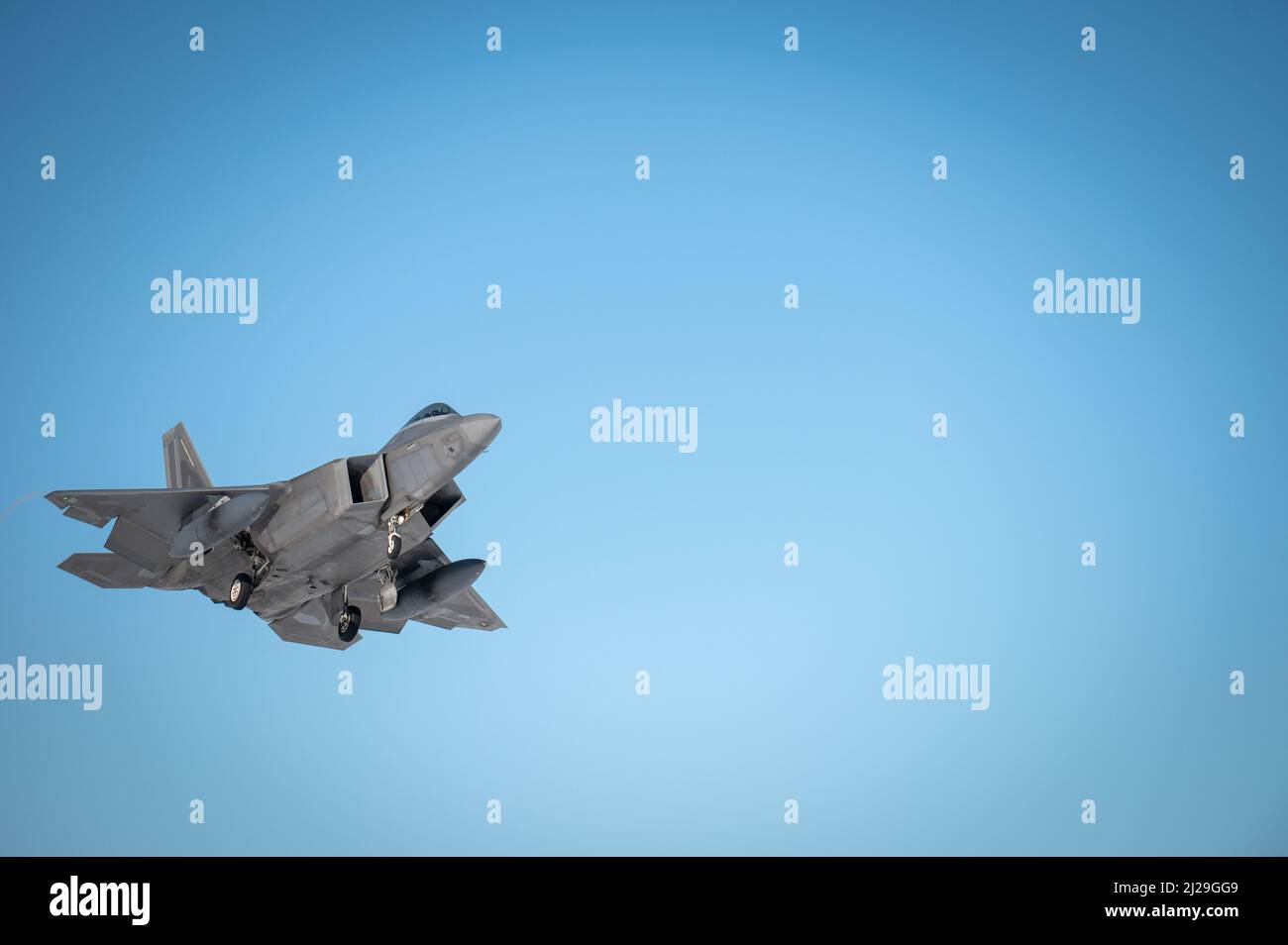 A U.S. Air Force F-22 Raptor assigned to the 3rd Wing flies during ...