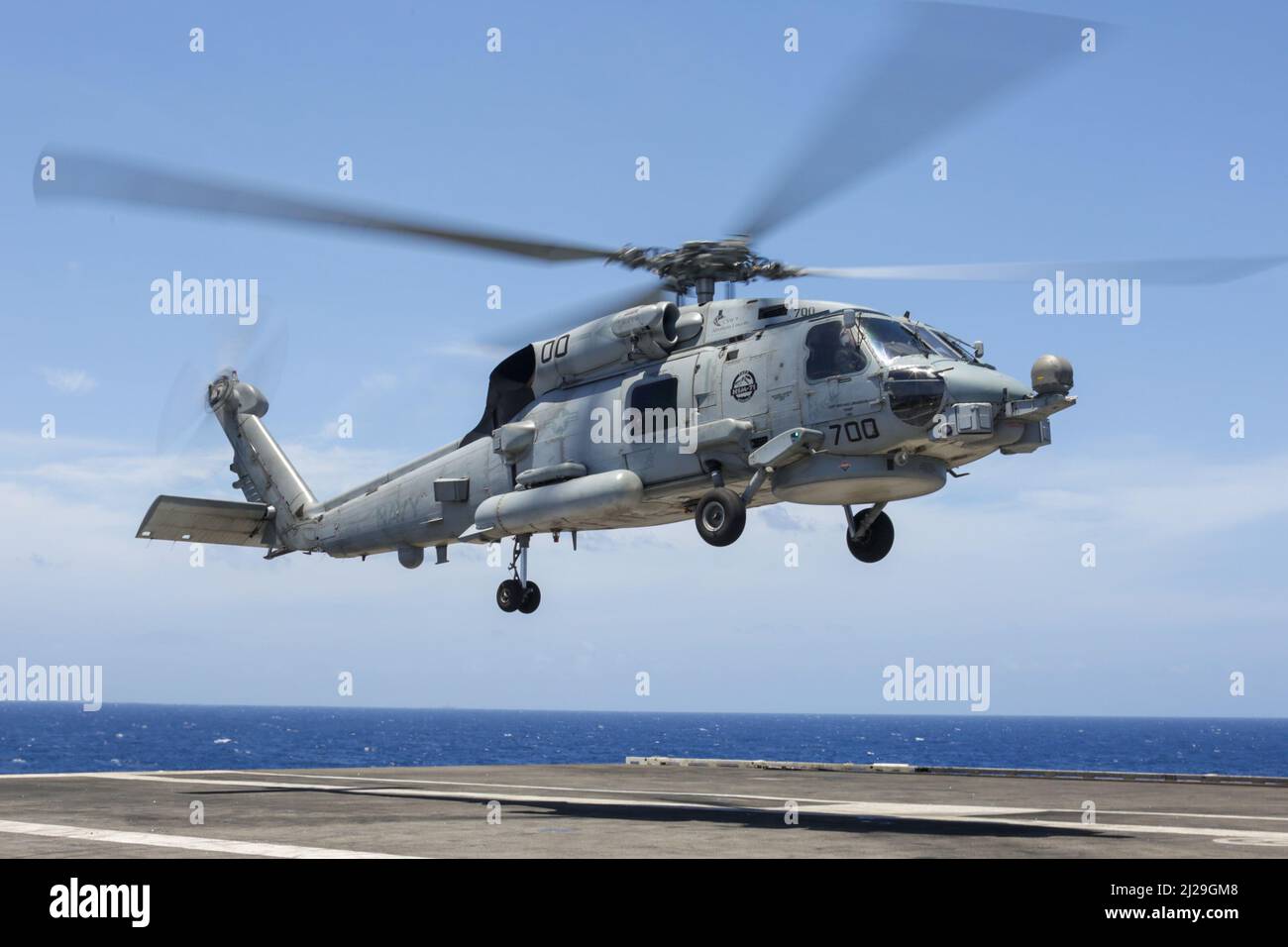 SOUTH CHINA SEA (March 30, 2022) An MH-60R Sea Hawk helicopter ...