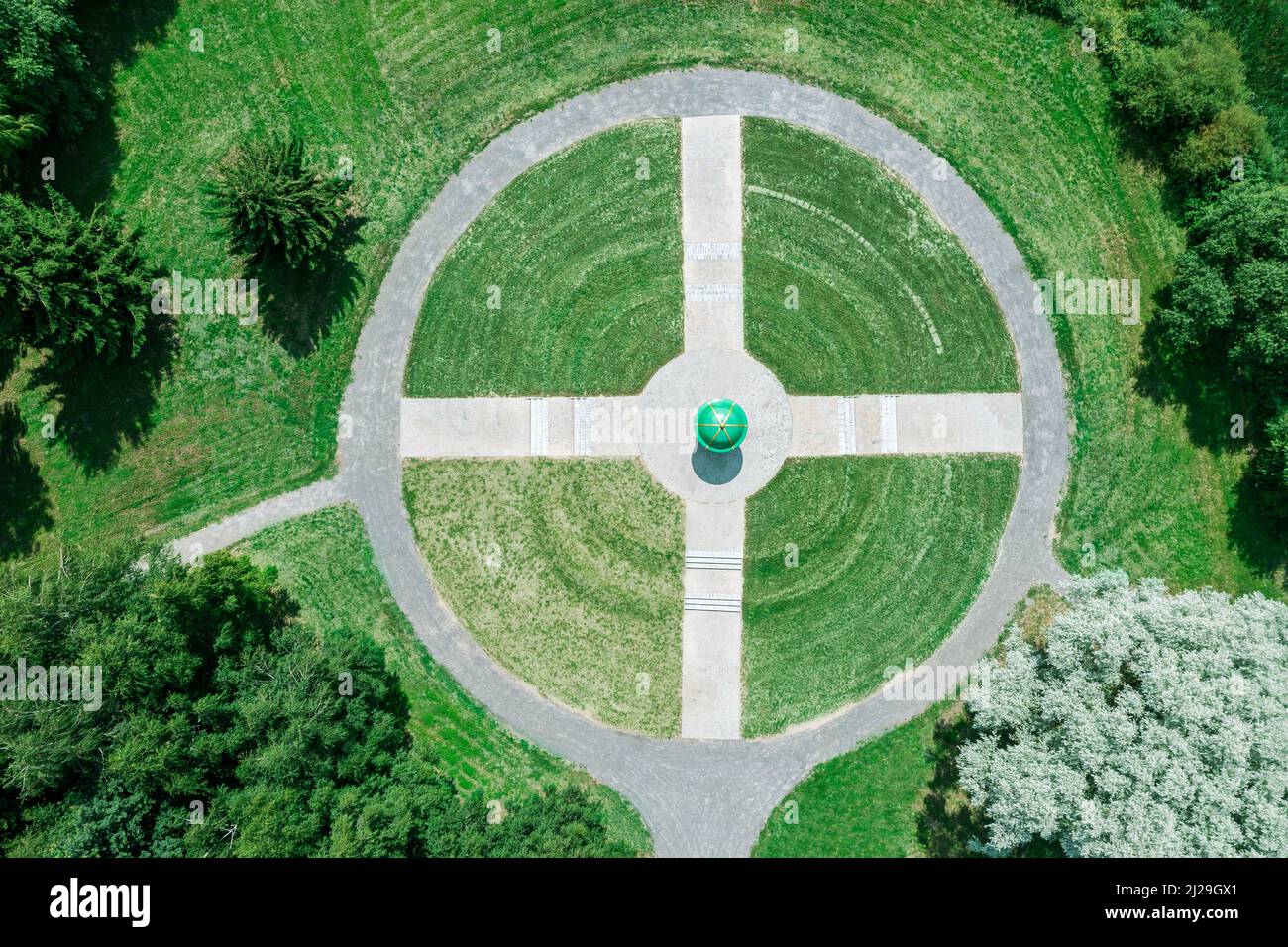 aerial top view of the round square in a green summer park. aerial ...