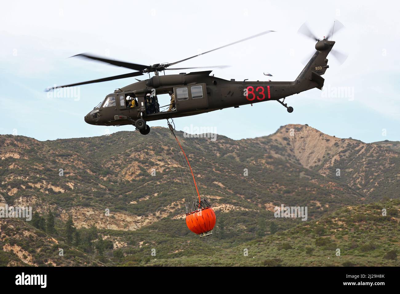A U.S. Army UH-60M Black Hawk helicopter flown by Soldiers from the 1st ...