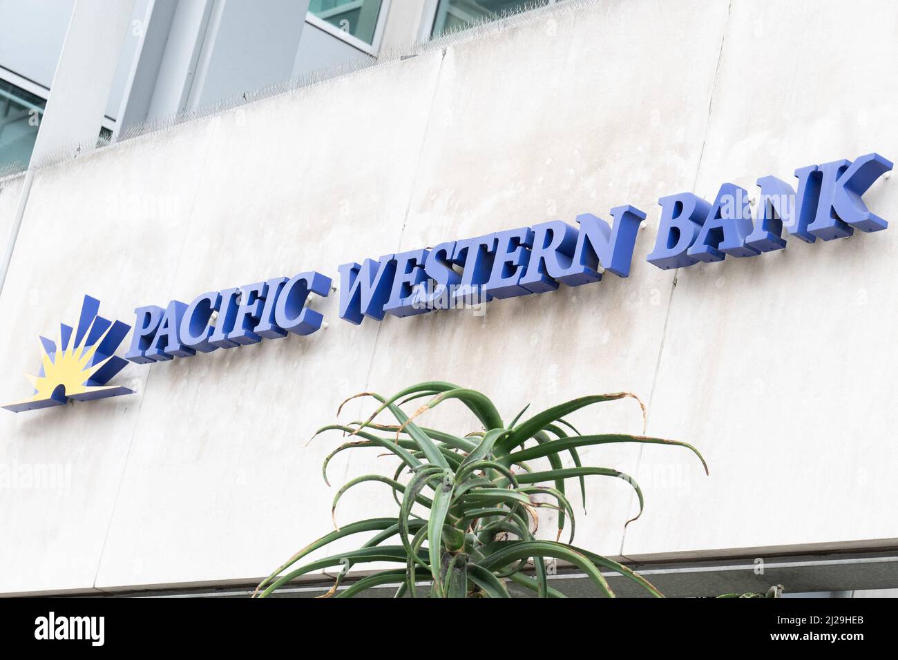 A shop sign of PACIFIC WESTERN BANK, on March 28 2022 in Los Angeles CA ...
