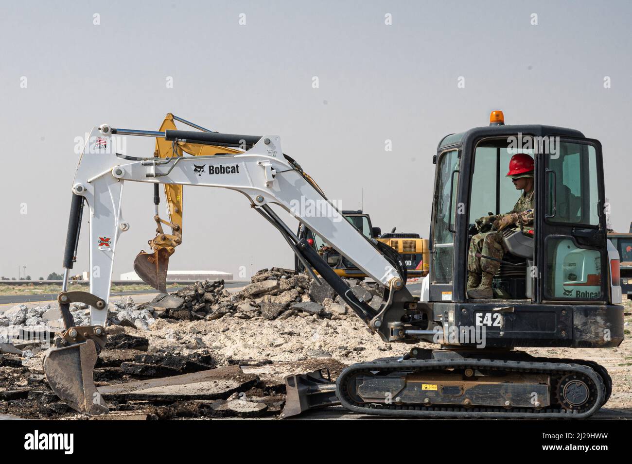 U.S. Airmen with the 557th Expeditionary Rapid Engineer Deployable ...