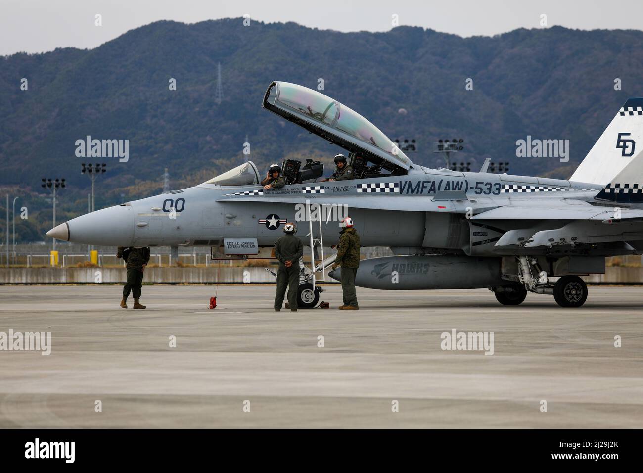 A U.S. Marine Corps F/A-18 Hornet with Marine All Weather Fighter ...