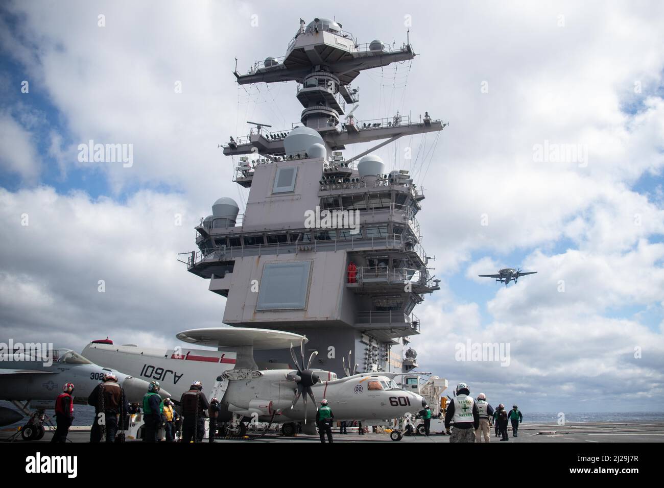 Sailors assigned to Carrier Air Wing (CVW) 8 and USS Gerald R. Ford ...