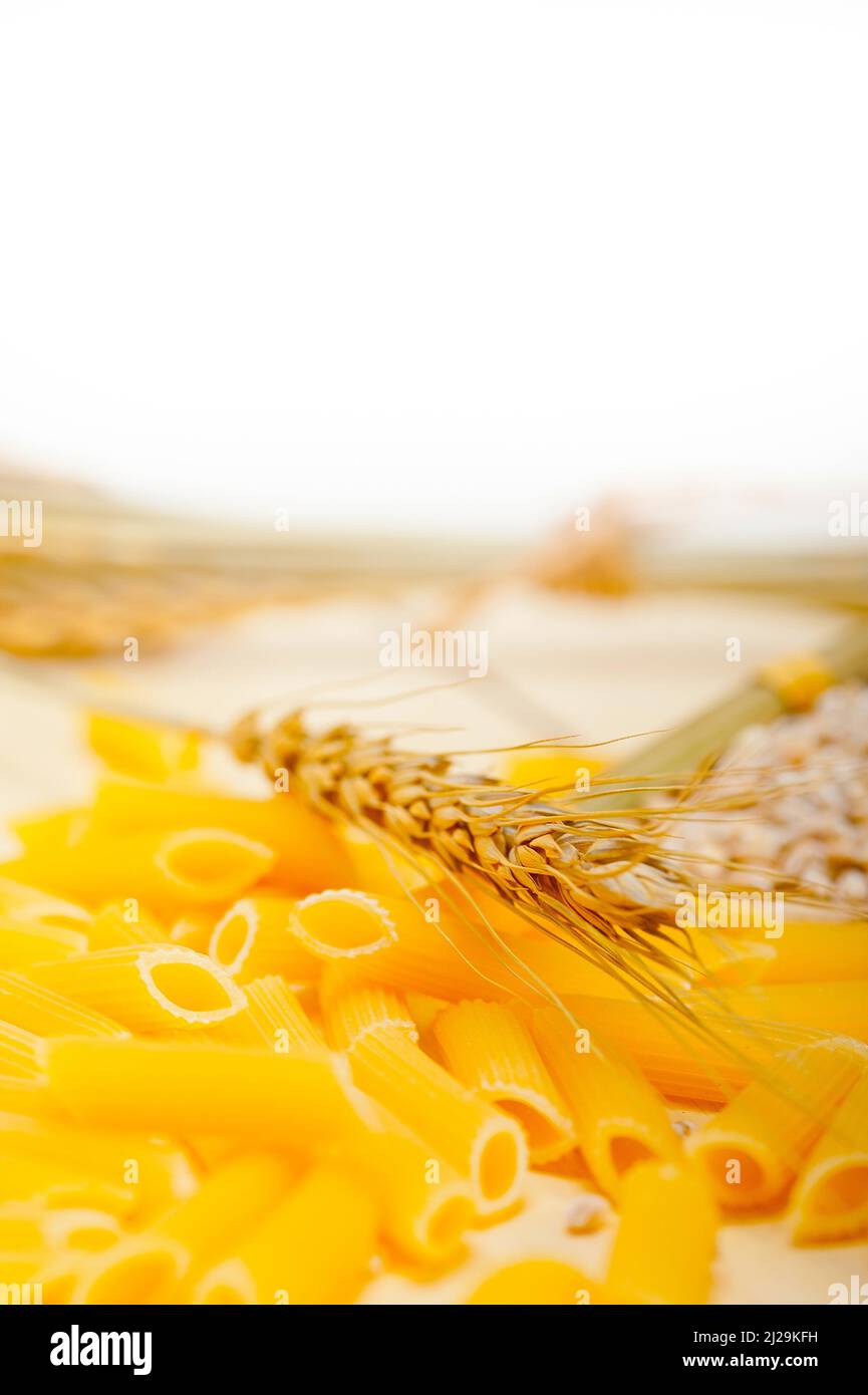 Short Italian pasta penne with durum wheat grains Stock Photo - Alamy