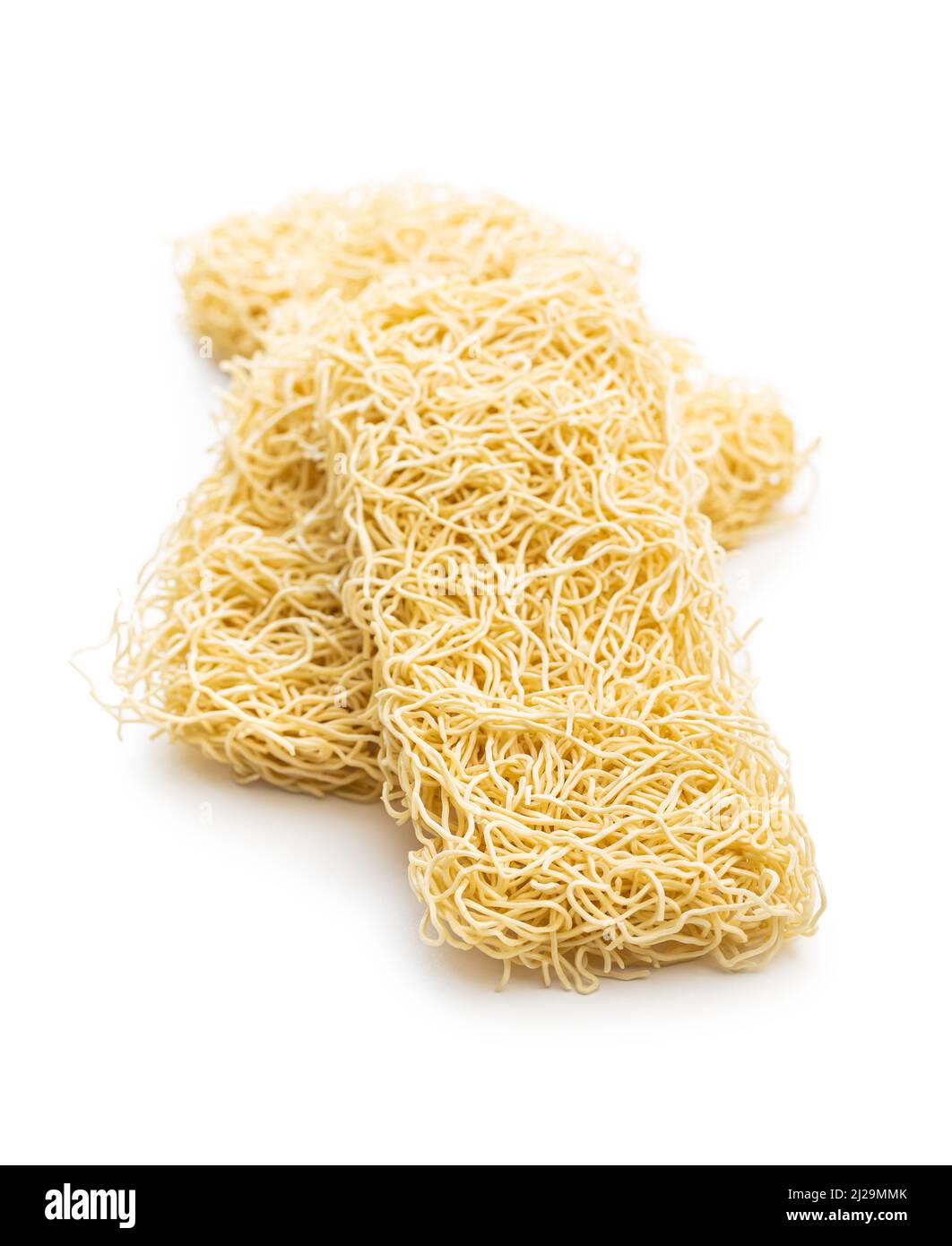 Instant noodles. Uncooked chinese noodles isolated on a white ...