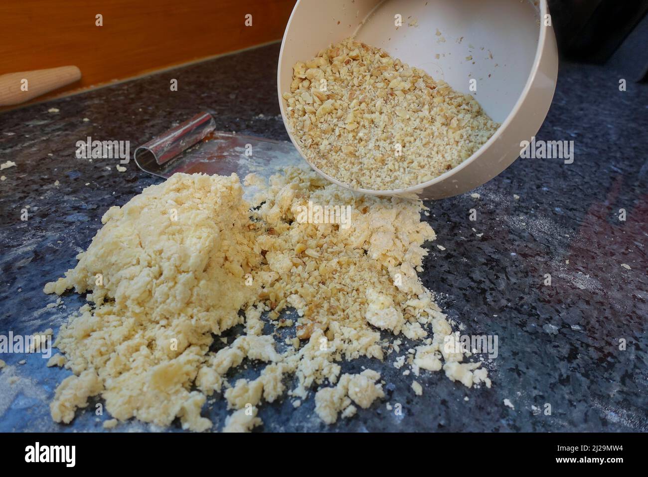 Southern German cuisine, baking, preparing the walnut dough for the ...