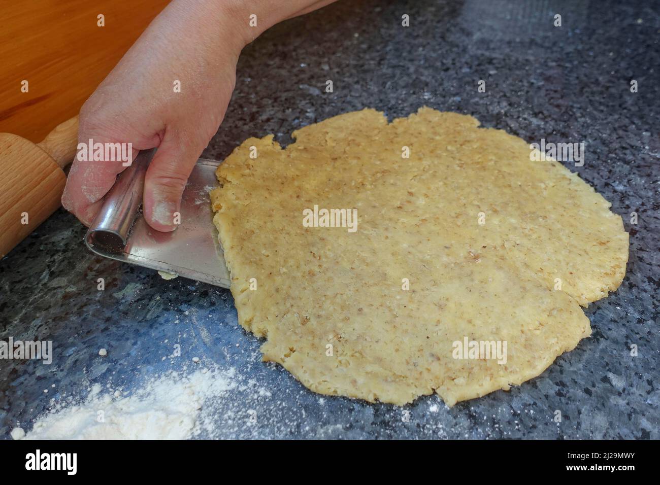 Southern German cuisine, baking, preparing the walnut dough for the ...
