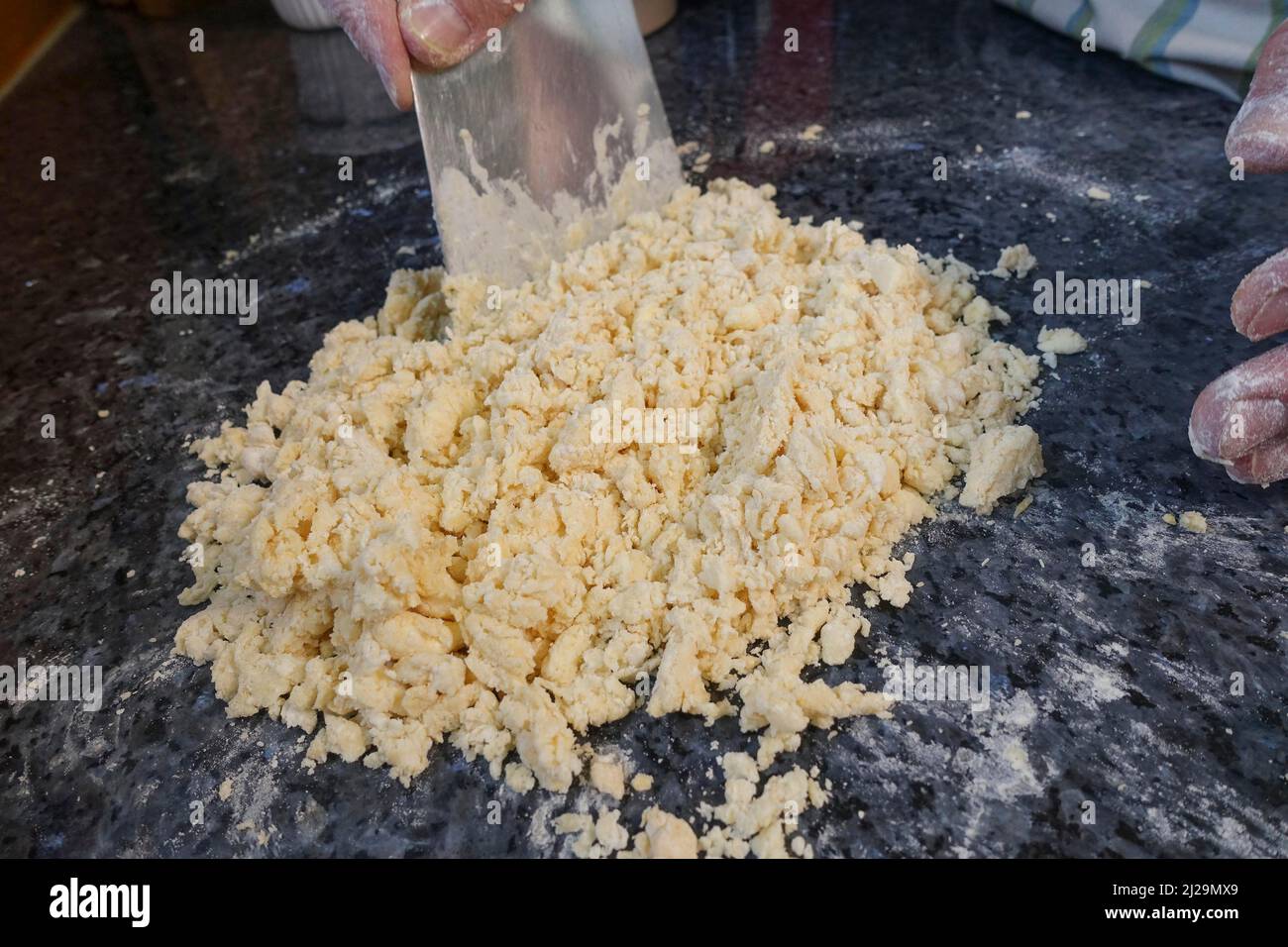 Southern German cuisine, baking, preparing the walnut dough for the ...