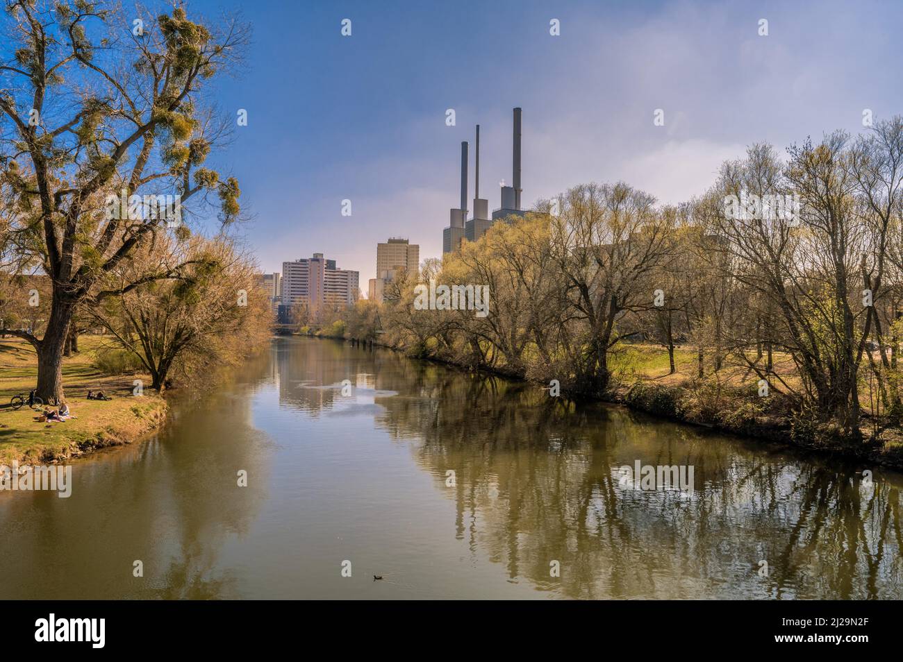The river Ihme with the combined heat and power plant called "the three ...