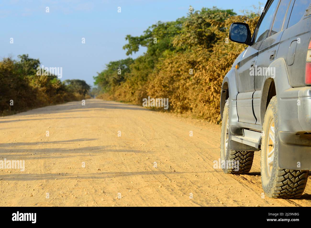 Off-road vehicle on the dusty Transpantaneira, Pantanal, Mato Grosso ...