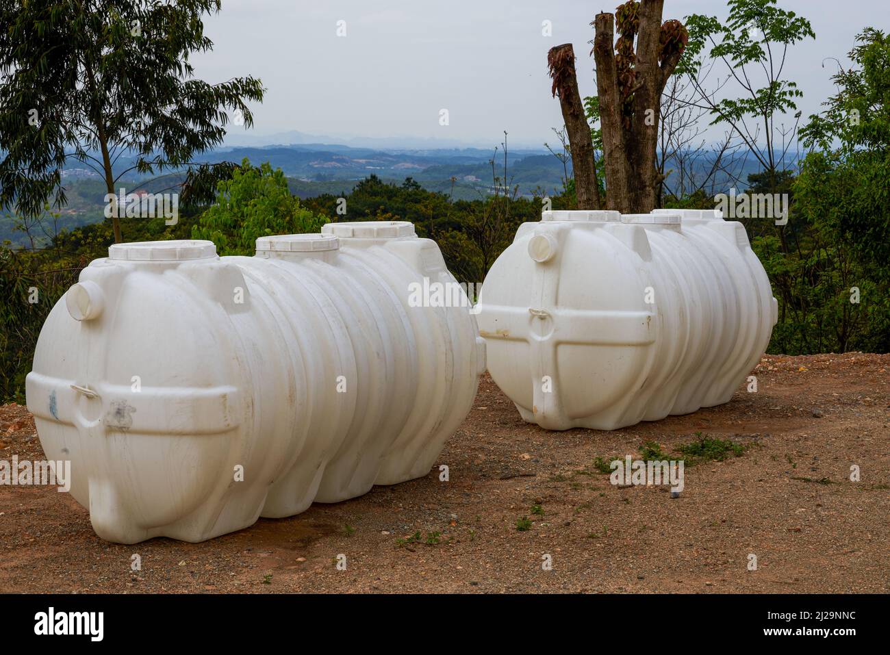 Close-up of two large water storage tanks outdoors Stock Photo - Alamy