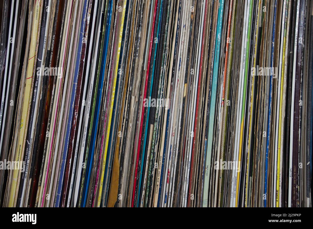 Old long-playing records stand on a shelf Stock Photo - Alamy