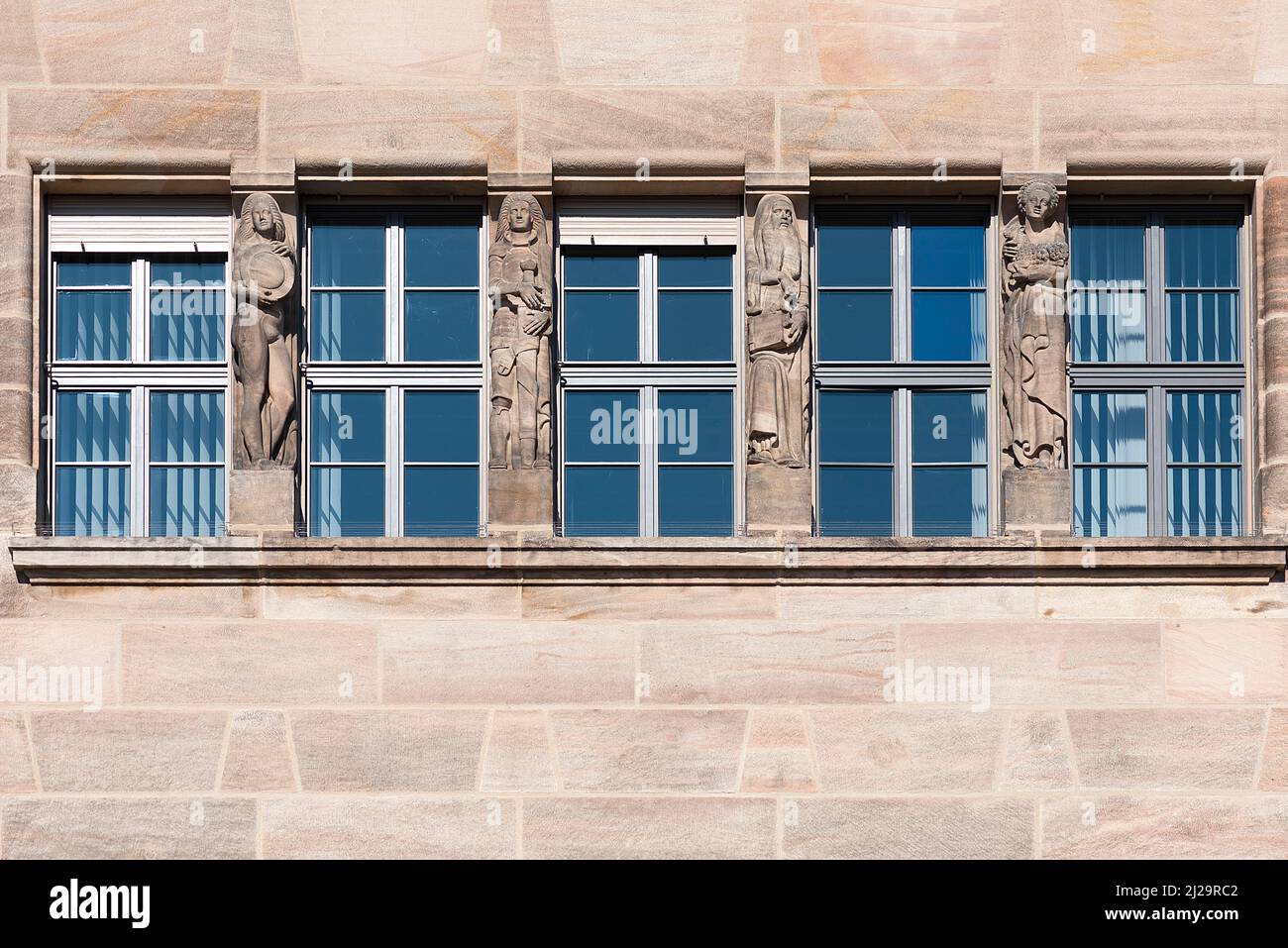 Sculptures on the facade of the Justice Building, built between 1909 ...