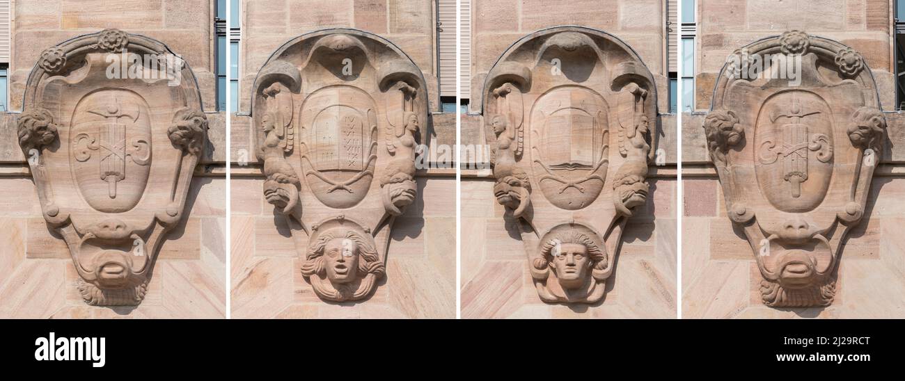 Four heraldic cartouches on the main facade of the courthouse, built ...