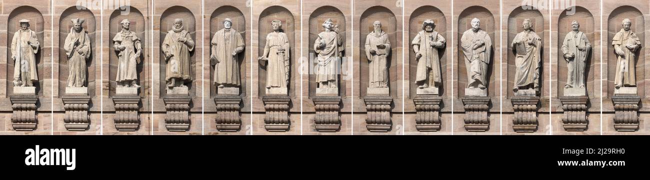 Collage of thirteen stone sculptures of historical legal scholars on ...