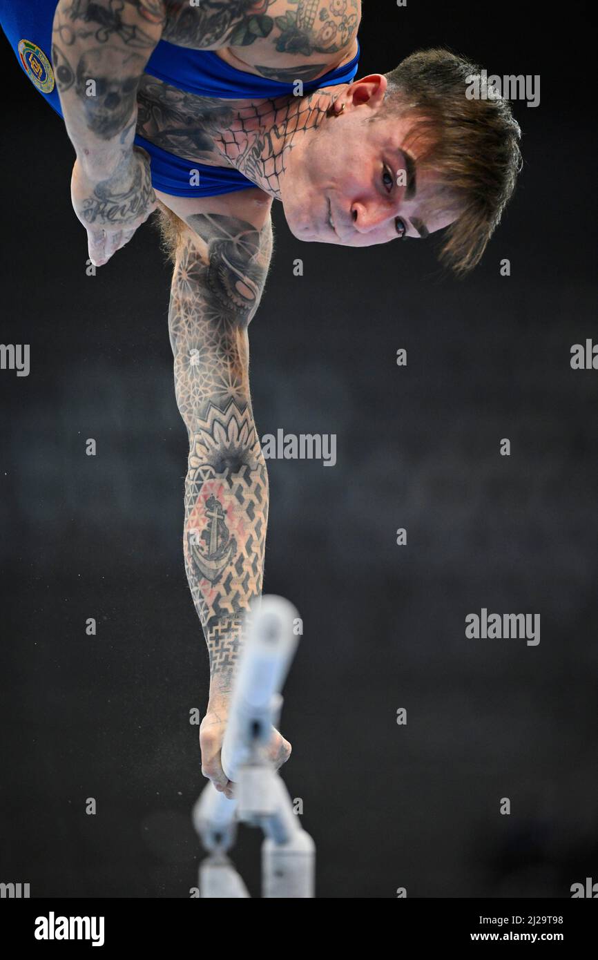 World Champion Nicola BARTOLINI (ITA) with tattoos, on parallel bars ...